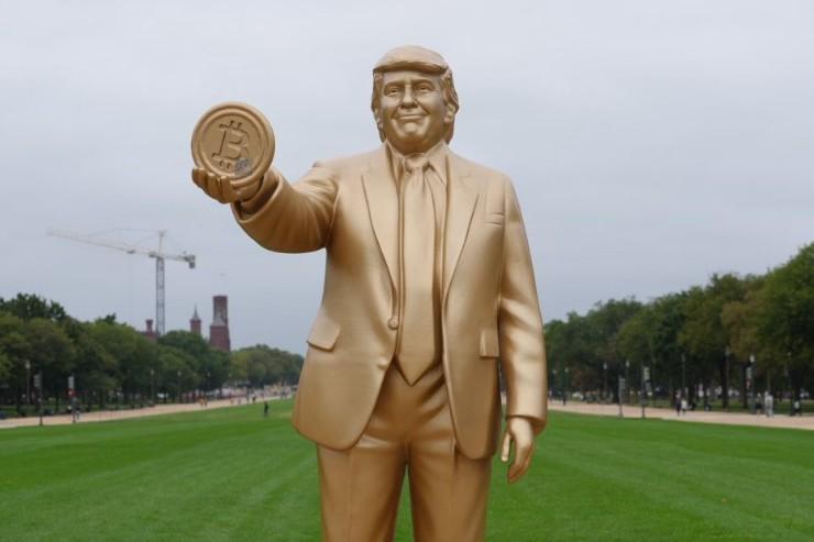 What Does Trump's Golden Statue Holding Bitcoin Outside The US Capitol ...